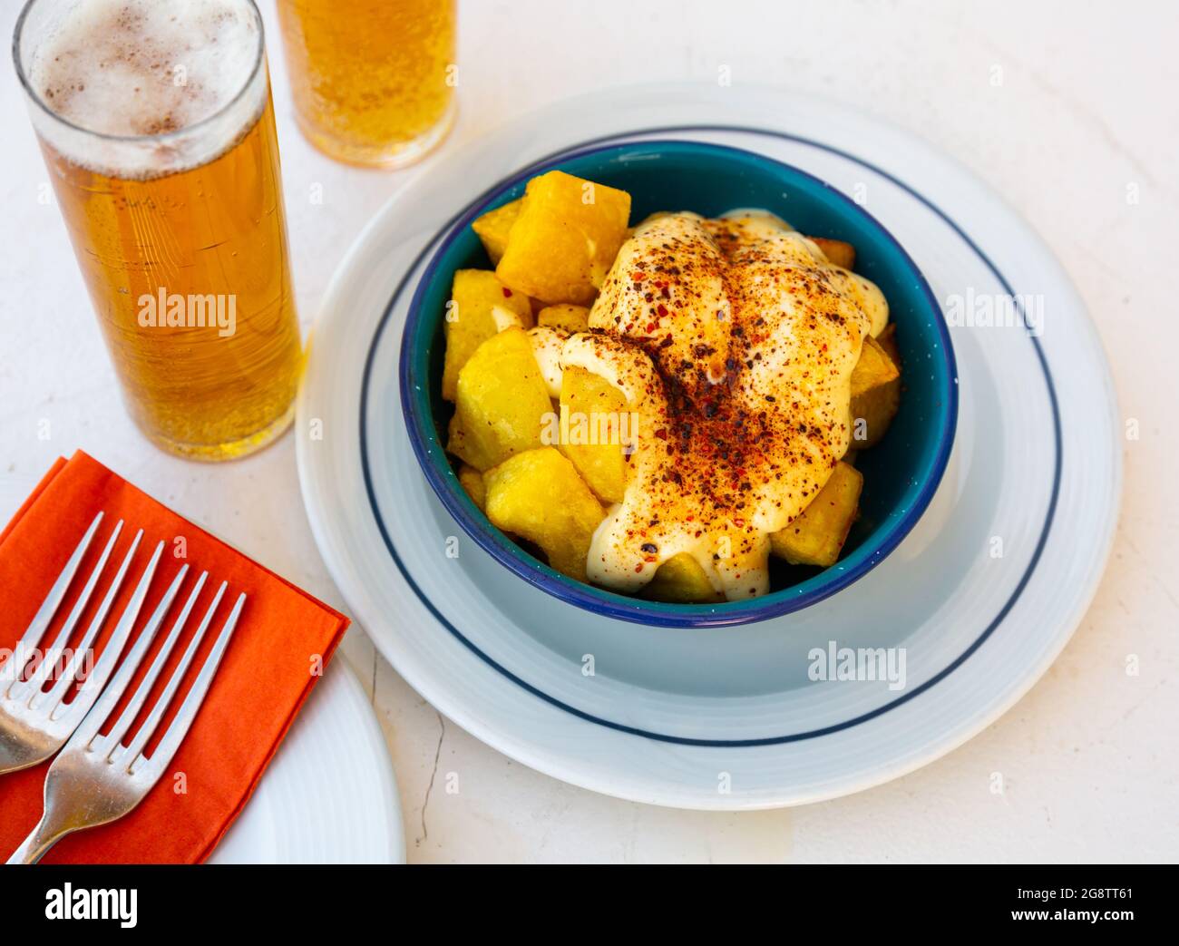 Spicy fried potatoes Patatas bravas with sauces Stock Photo - Alamy