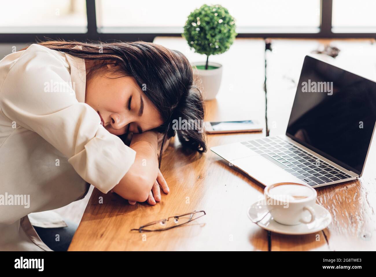 Lifestyle freelance woman he has resting sleeping after hard work long ...