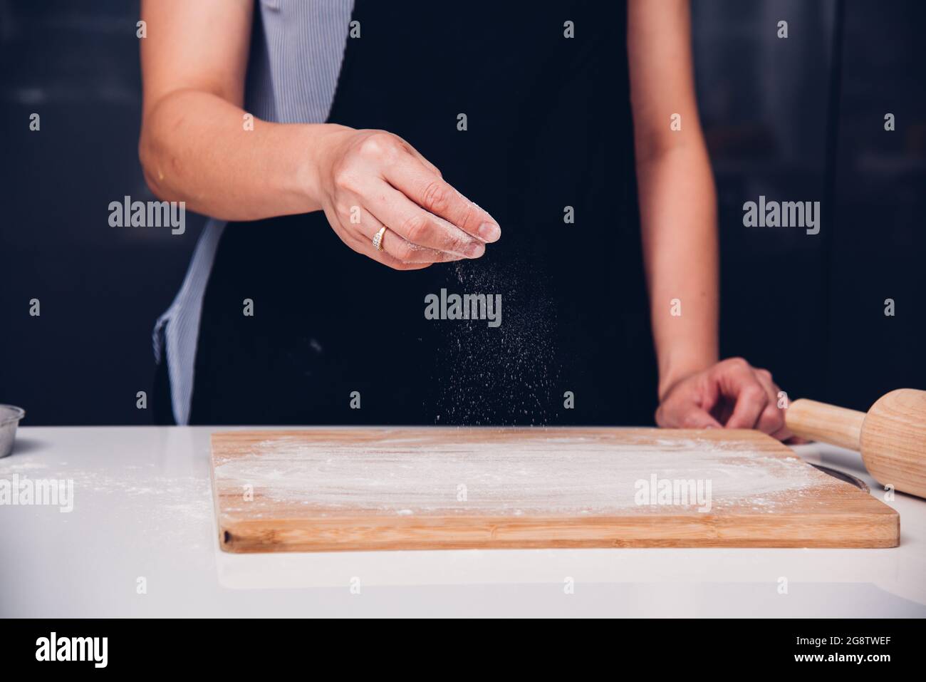 Sprinkling powder hands hi-res stock photography and images - Alamy