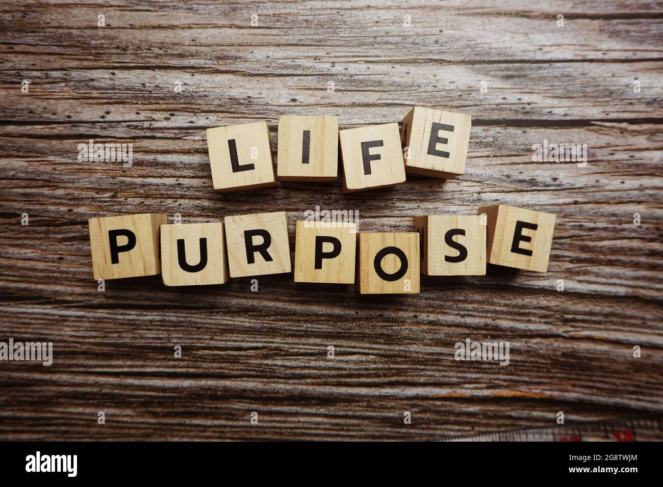 Life Purpose alphabet letters on wooden background Stock Photo - Alamy