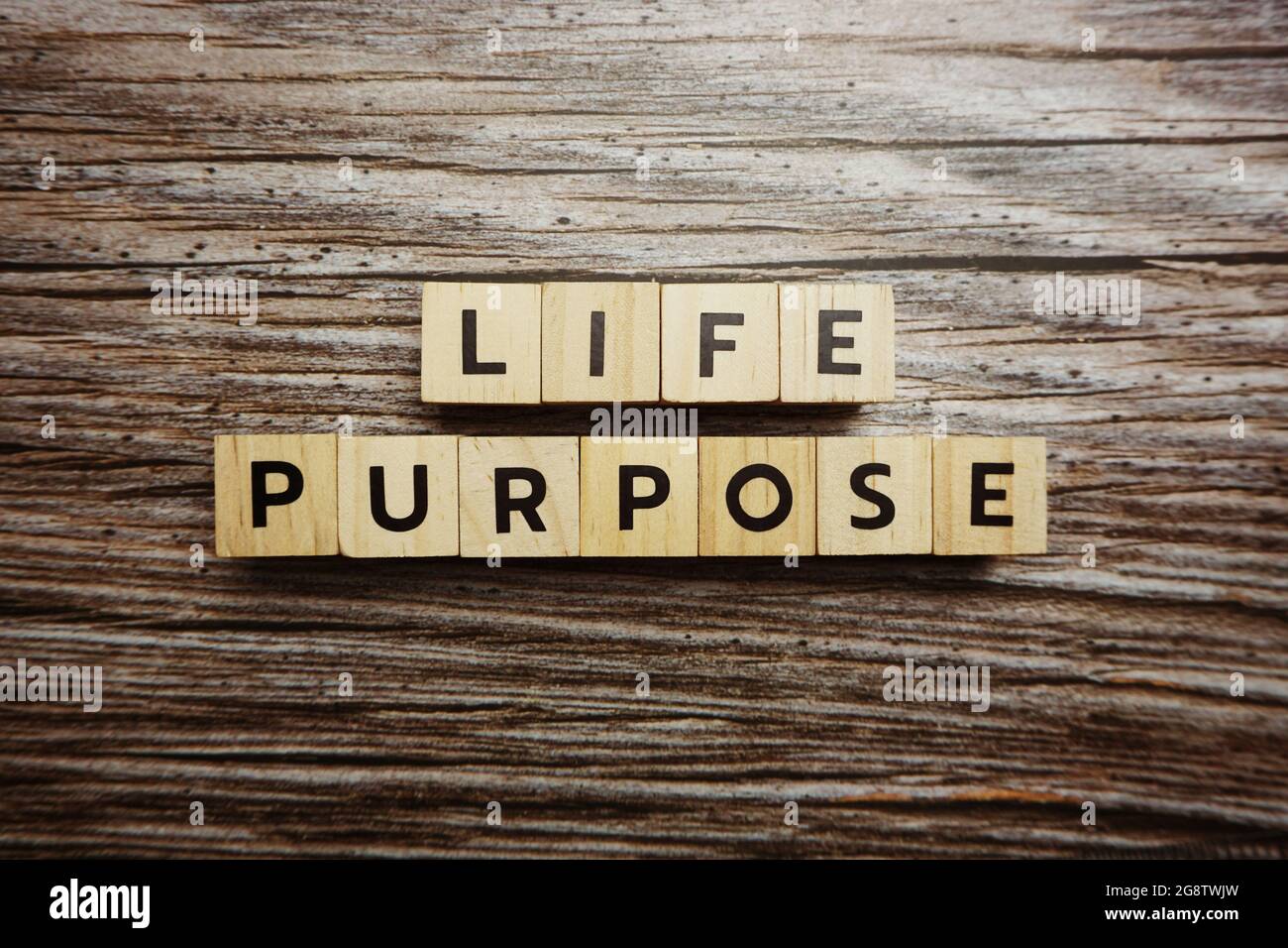 Life Purpose alphabet letters on wooden background Stock Photo - Alamy