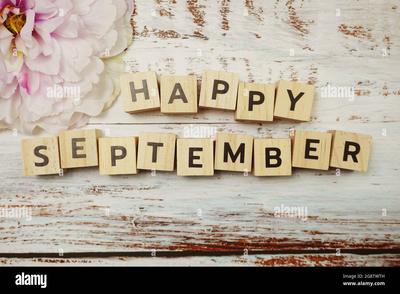 Happy September alphabet letters on wooden background Stock Photo - Alamy