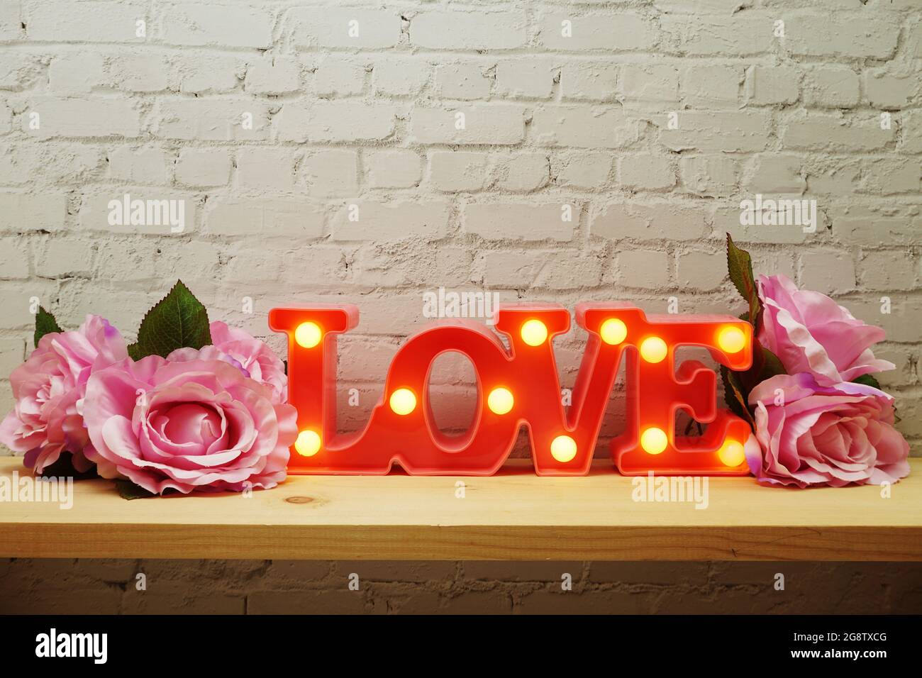 Pink brick wall heart hi-res stock photography and images - Alamy