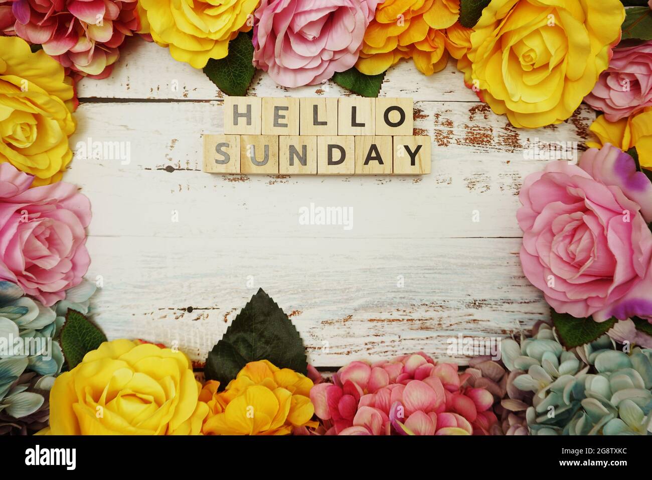 Hello Sunday alphabet letter with colorful flowers border frame on ...