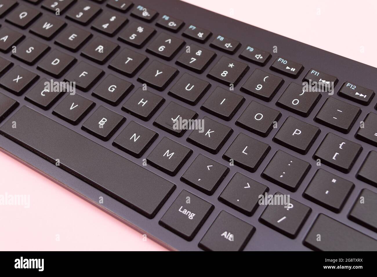 Black Bluetooth Keyboard for Tablet or PC on Pink Background Stock ...