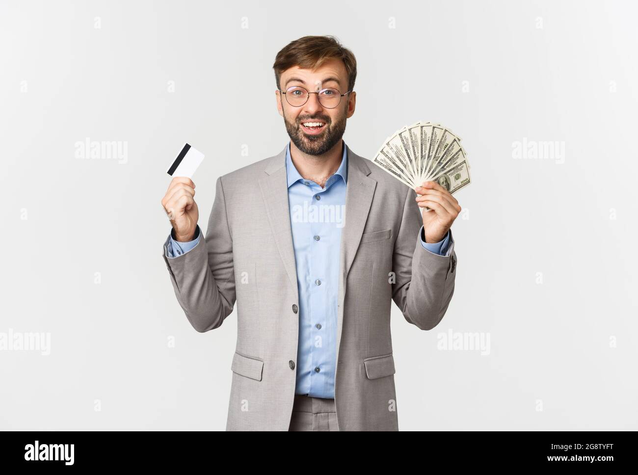 Image of handsome rich businessman in grey suit and glasses, shopping ...