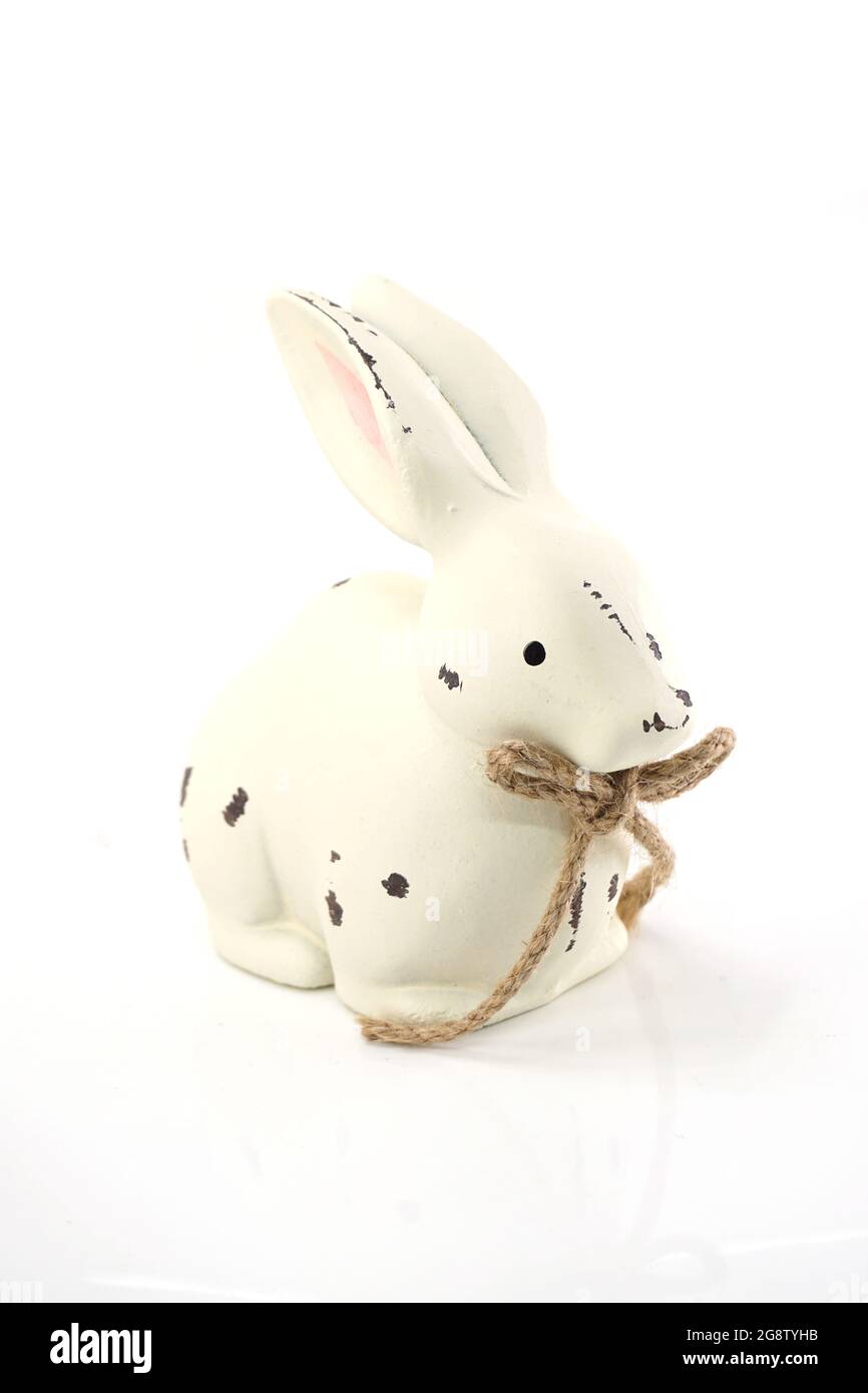 white rabbit figure isolated on white background Stock Photo - Alamy