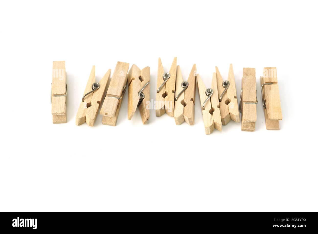 wooden clip isolated on white background Stock Photo - Alamy