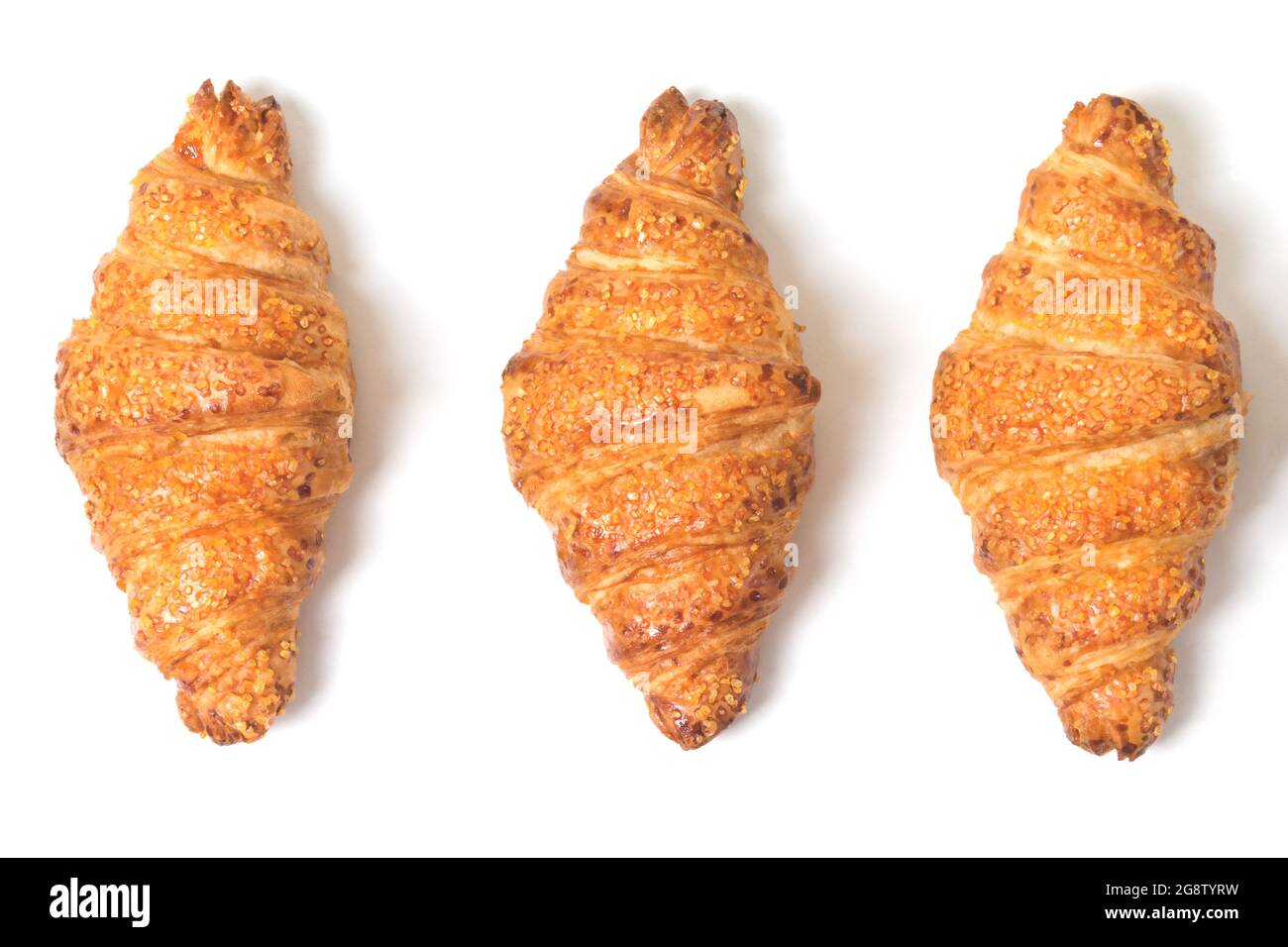 three tasty croissants on white background. French breakfast. Flatly ...