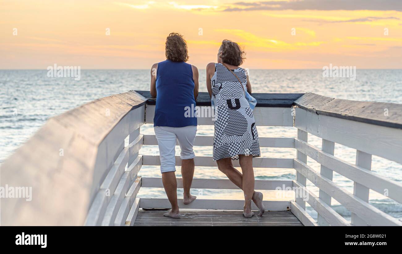 overlooking the ocean at sunset Stock Photo - Alamy