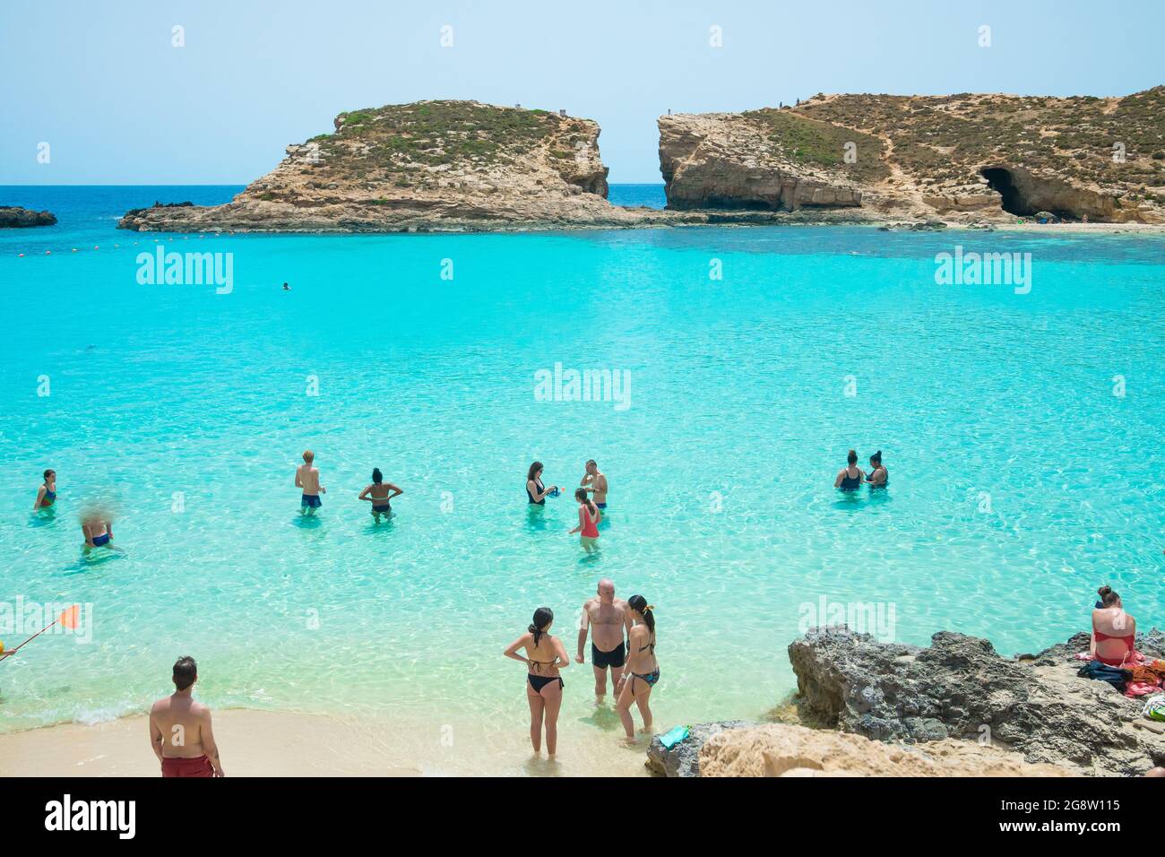 COMINO, MALTA - Jul 14, 2021: A sunny day at the beach in Malta with ...