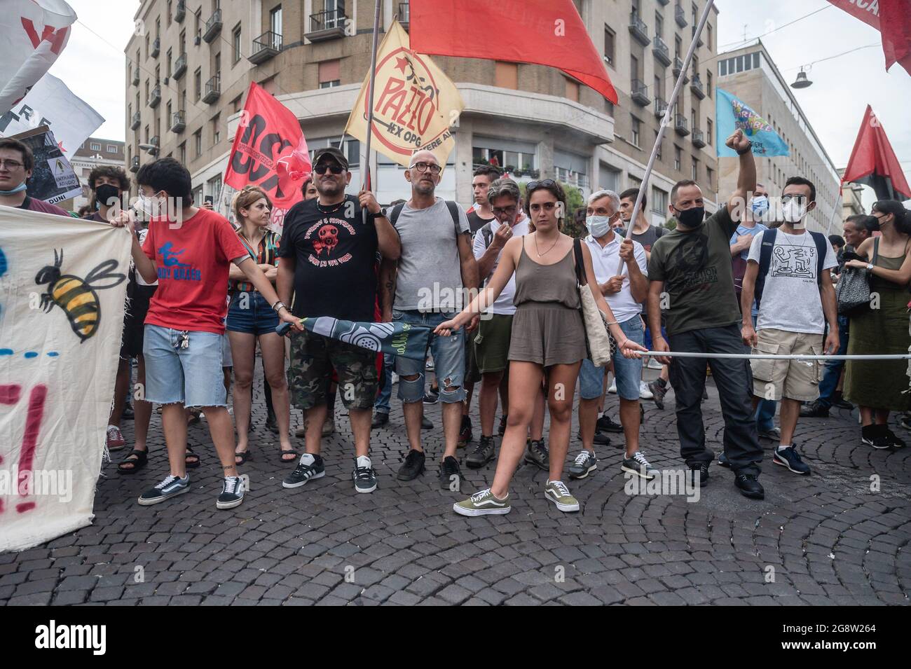 Napoli, Italy. 22nd July, 2021. Protesters hold flags during the ...