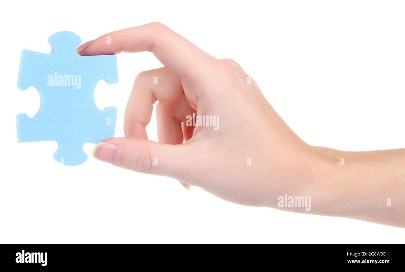 Hand and puzzle, isolated on white Stock Photo - Alamy