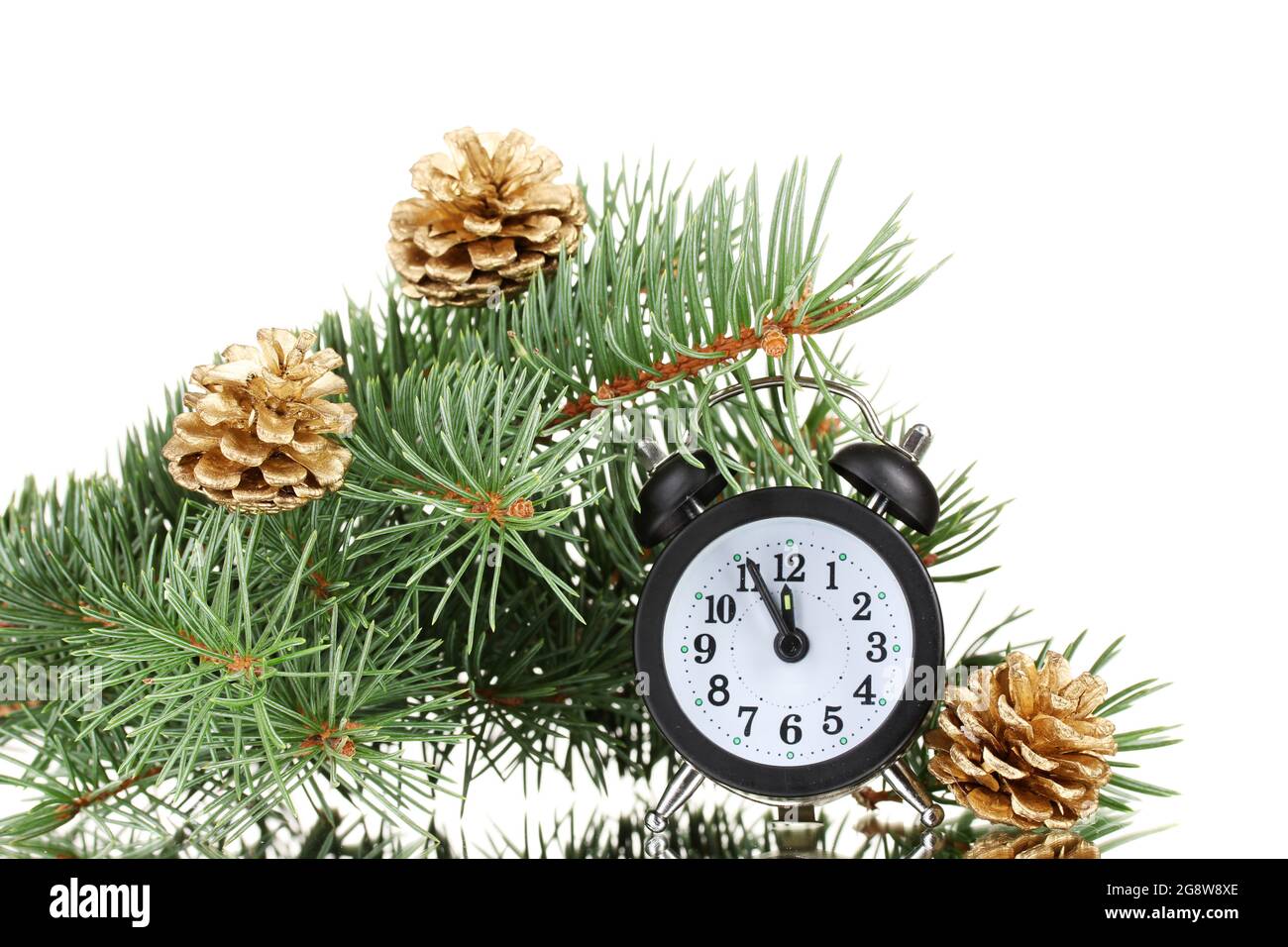 Green Christmas tree and clock isolated on white Stock Photo - Alamy