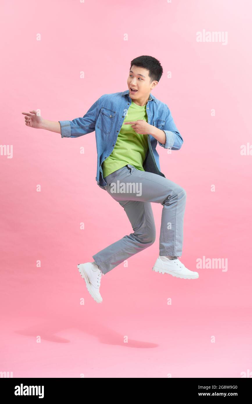 Happy man jumping hi-res stock photography and images - Alamy