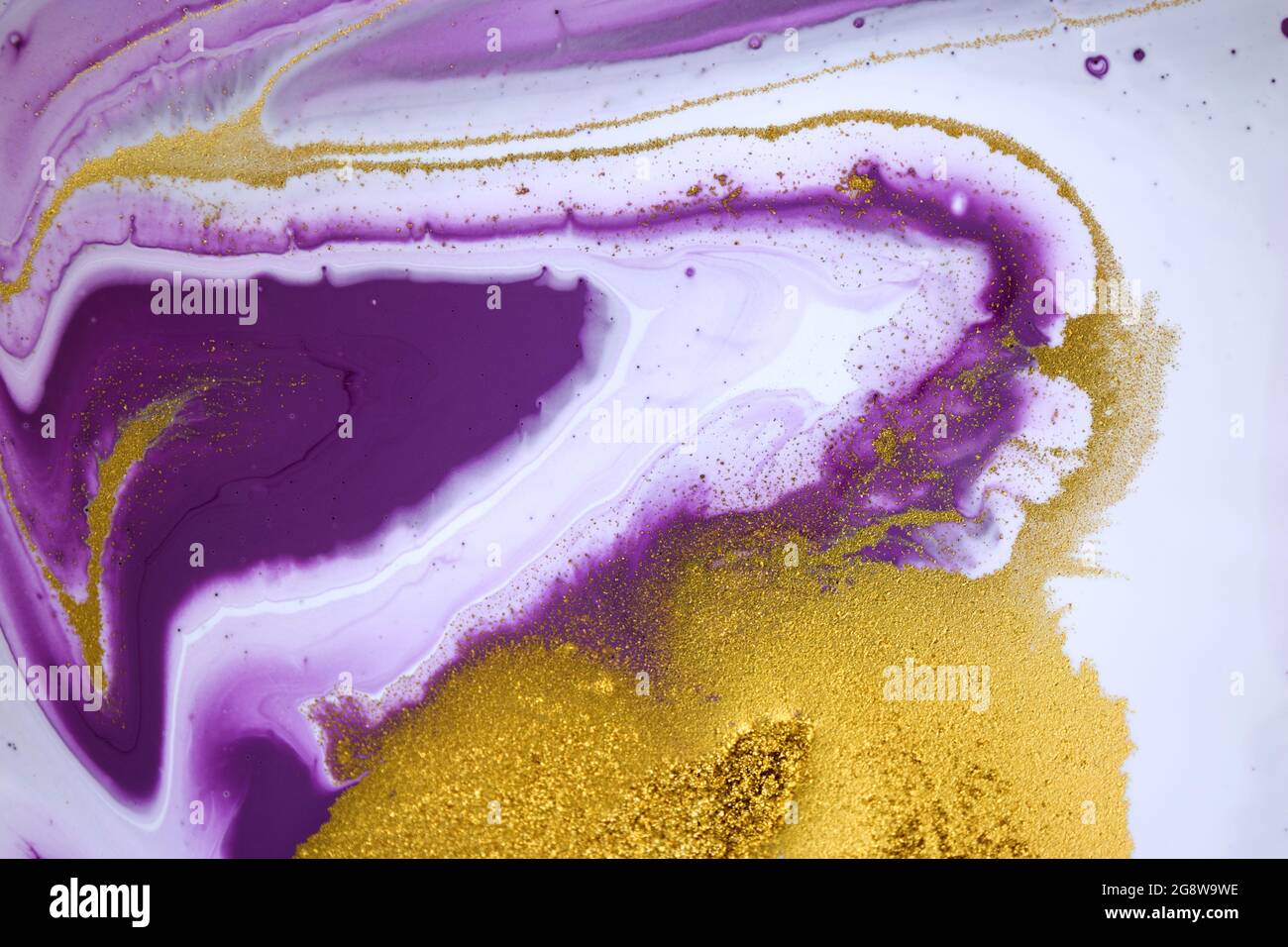 Marble purple acrylic texture with gold glitter. Close up liquid ink ...