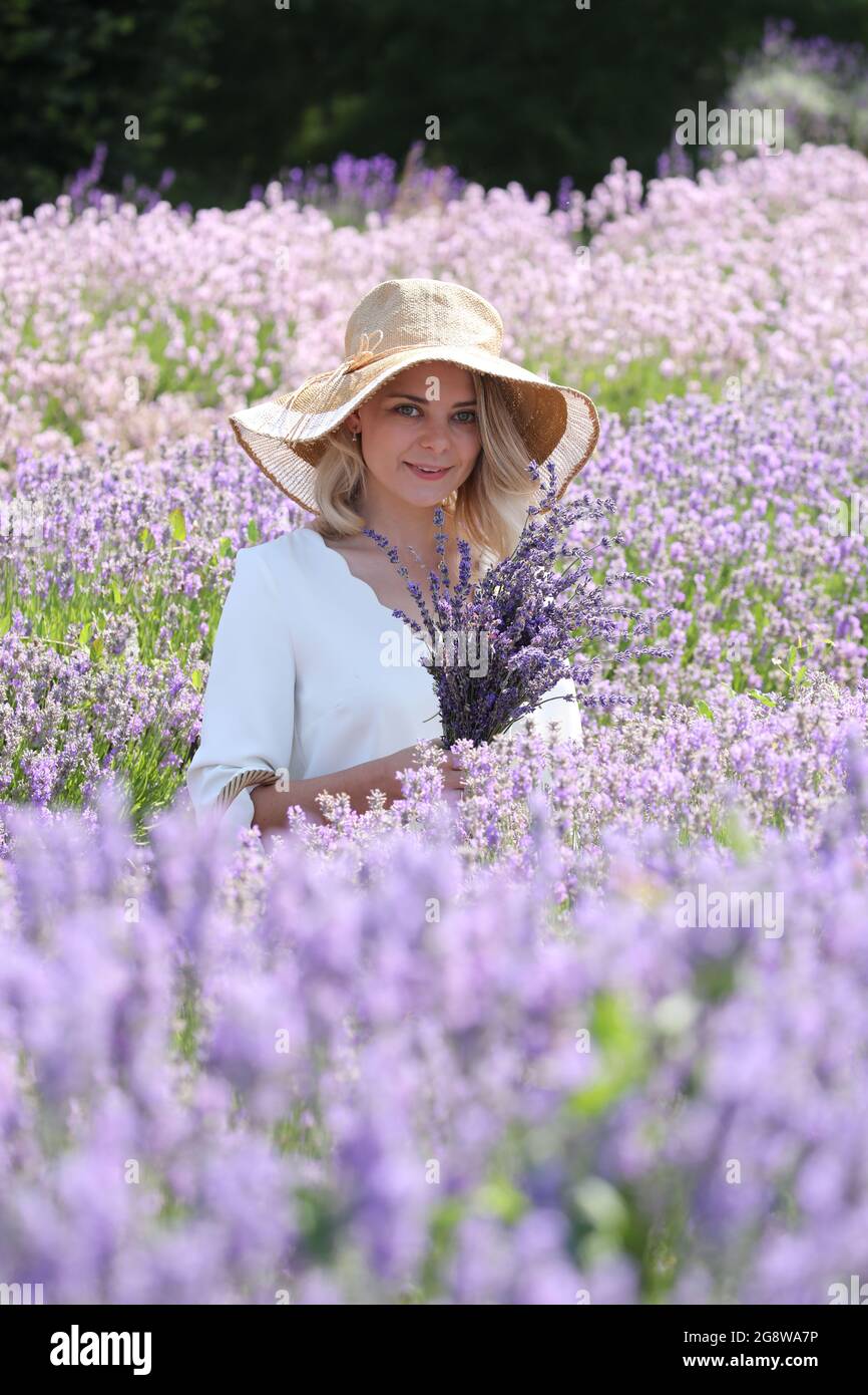 Heacham, UK. 21st July, 2021. Gem Thomas admires the lavender during ...