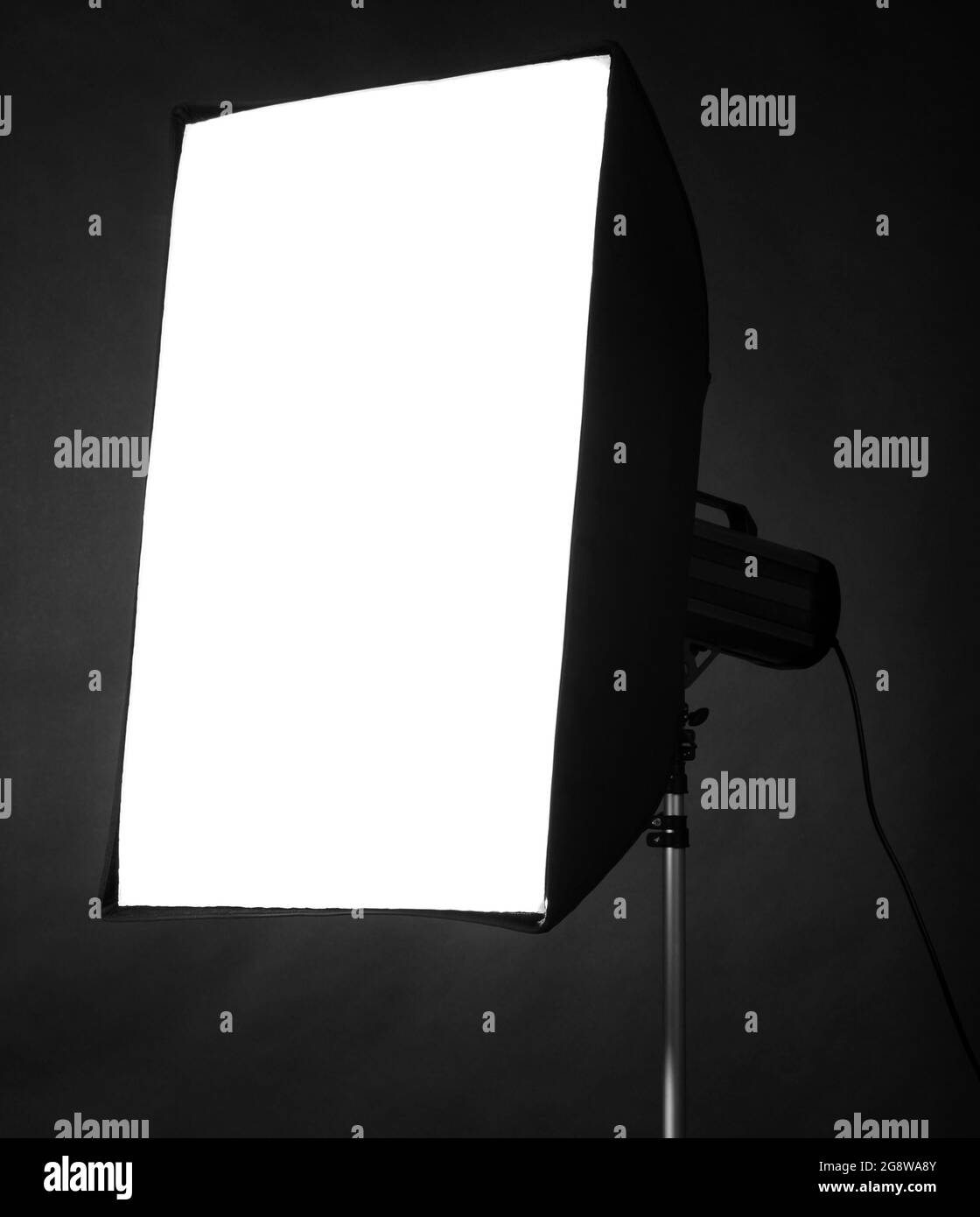 Studio flash with soft-box on grey background Stock Photo - Alamy