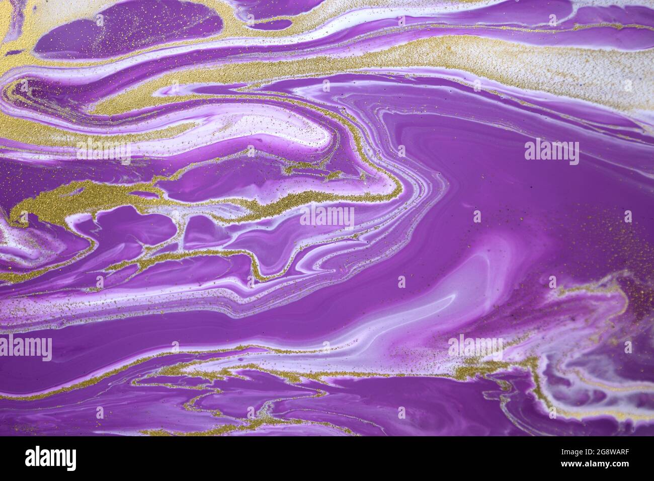 Marble purple acrylic texture with gold glitter. Close up liquid ink ...