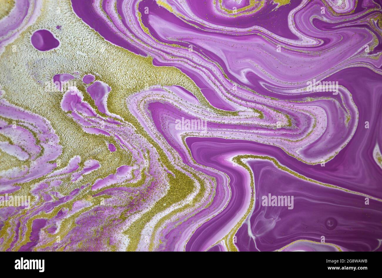 Marble purple acrylic texture with gold glitter. Close up liquid ink ...
