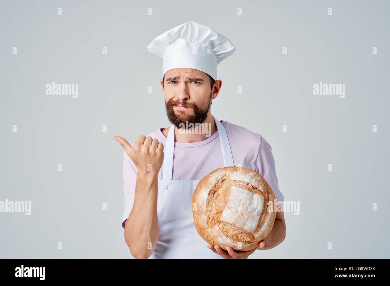 emotional male baker cooking cooking professional Stock Photo - Alamy