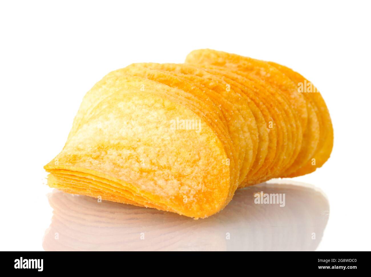 Delicious potato chips isolated on white Stock Photo - Alamy