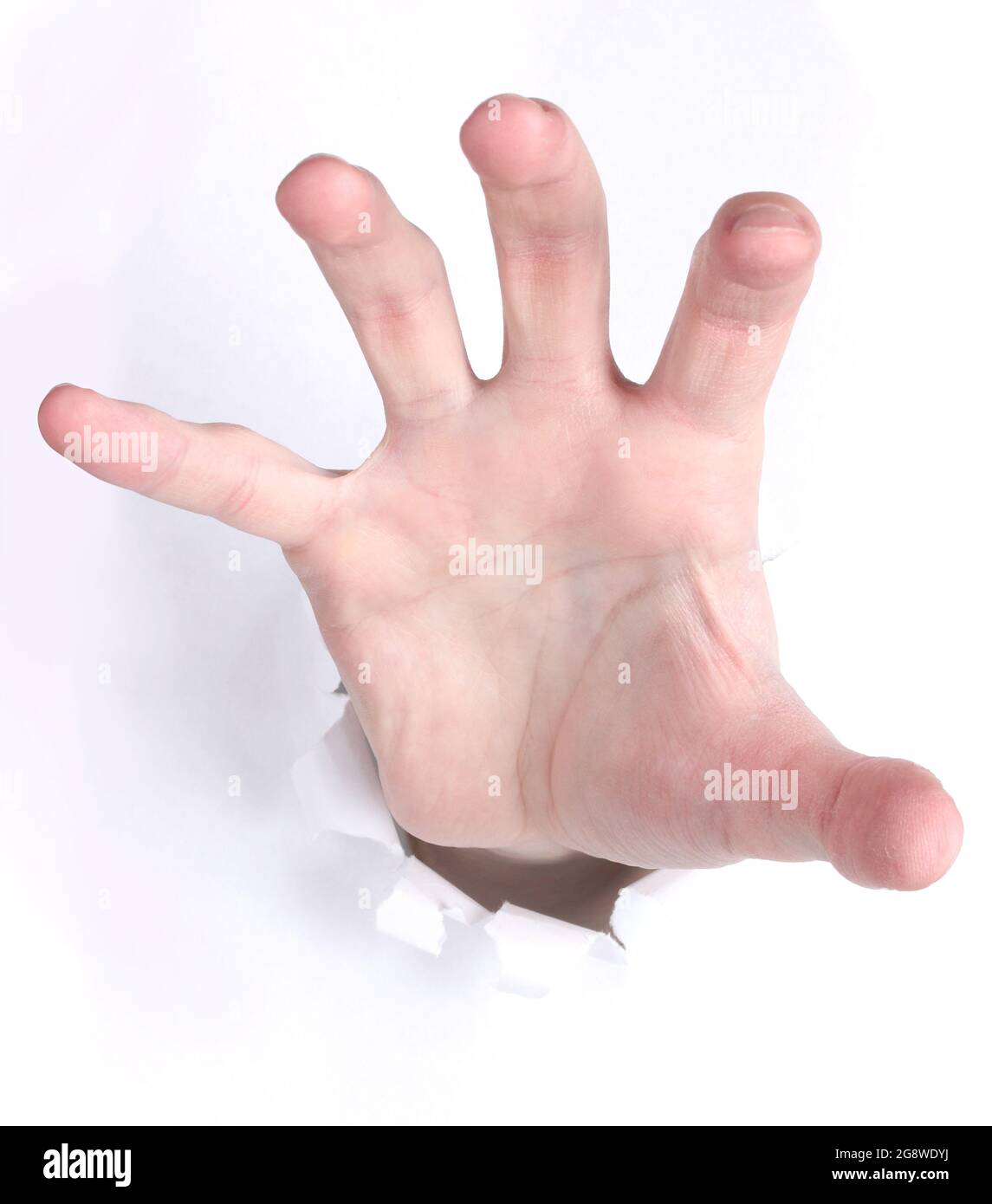 Hand breaking through the paper Stock Photo - Alamy