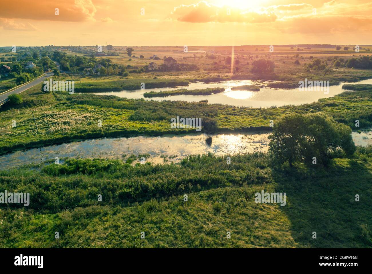 Aerial view of the brook on the meadow. The countryside in spring ...