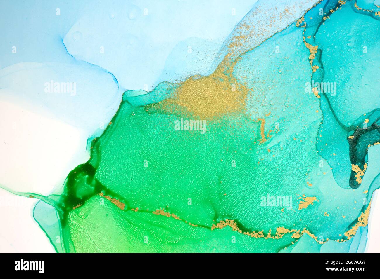 Watercolor green, blue and gold abstract stains background. Ink ...