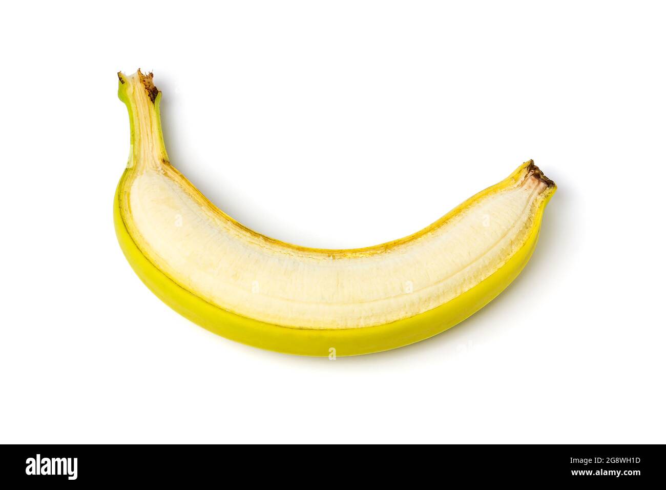 peeled banana on one side isolated on a white background. Peeled banana ...