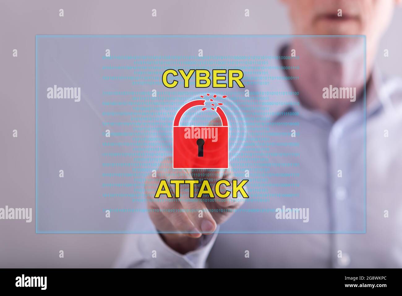 Man touching a cyber attack concept on a touch screen with his finger ...