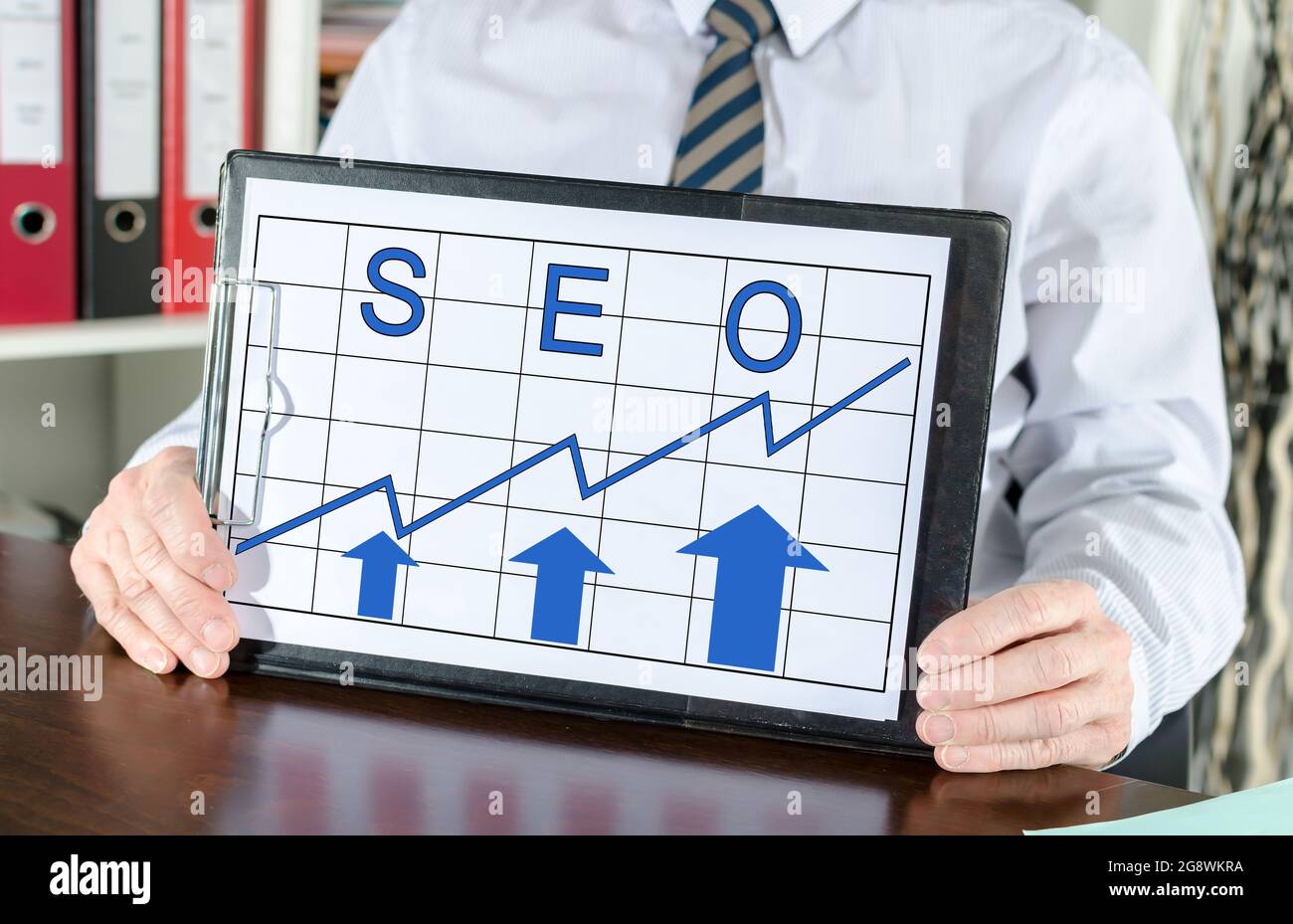 Seo concept shown by a businessman Stock Photo - Alamy
