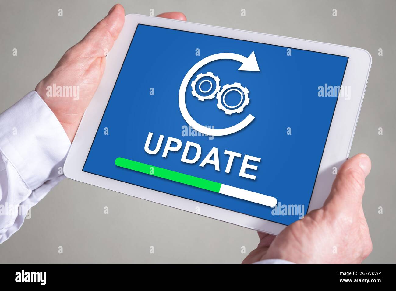 Tablet screen displaying an update concept Stock Photo - Alamy