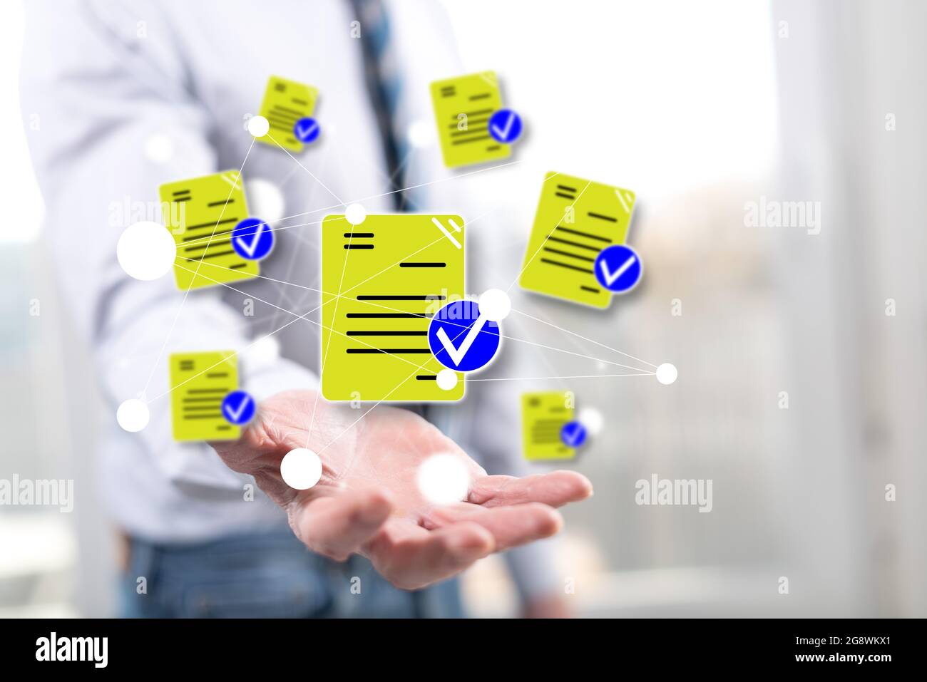 Document validation concept above the hand of a man in background Stock ...