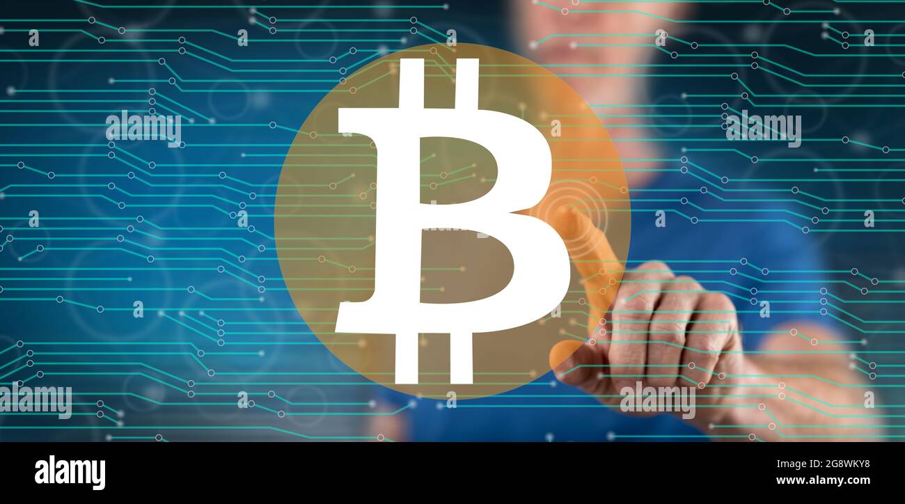 Man touching bitcoin concept hi-res stock photography and images - Alamy