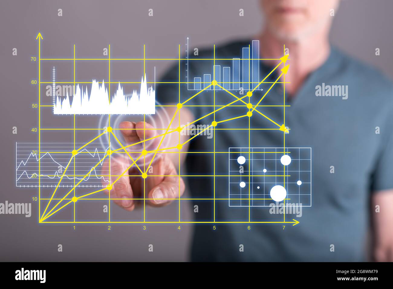 Man touching business charts on a touch screen with his finger Stock ...