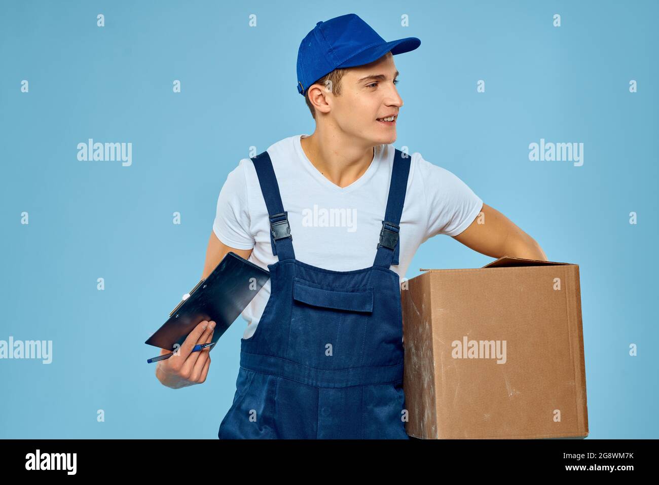 worker male delivery professional service Stock Photo - Alamy