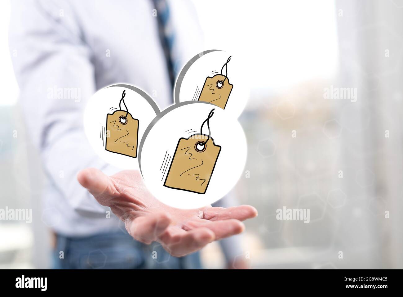 Brand concept above the hand of a man in background Stock Photo - Alamy