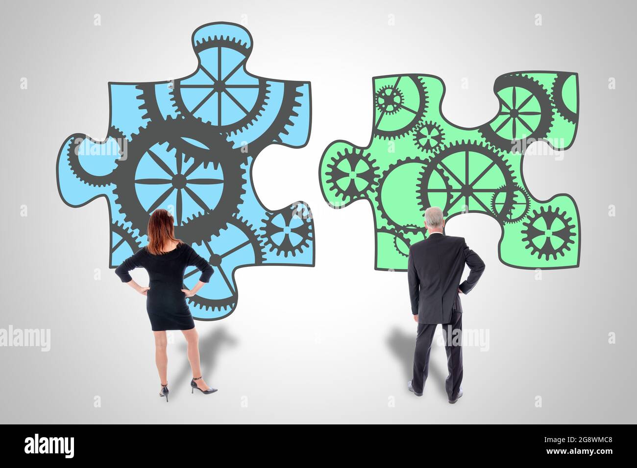 Teamwork concept drawn on a wall watched by business people Stock Photo ...