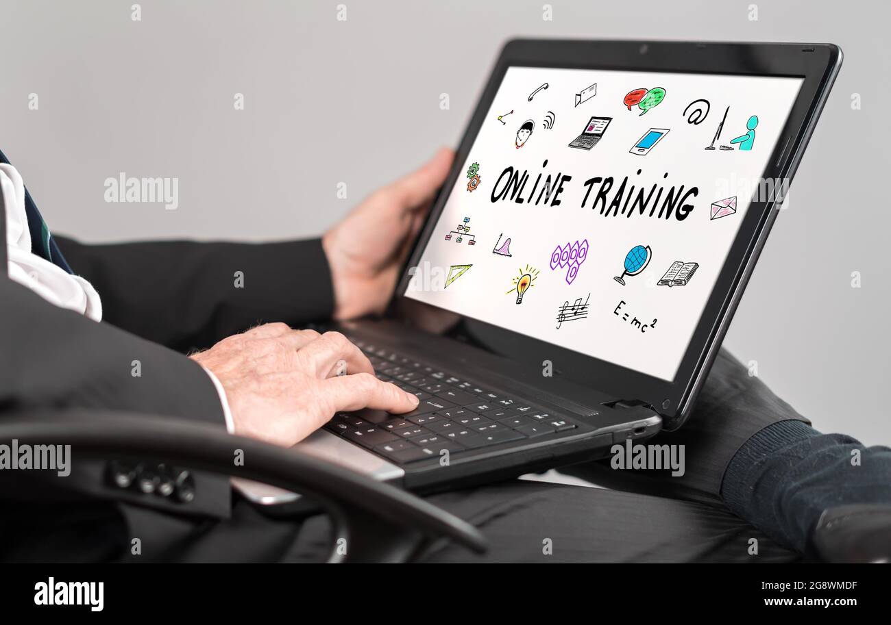Businessman watching online training concept on a laptop Stock Photo ...