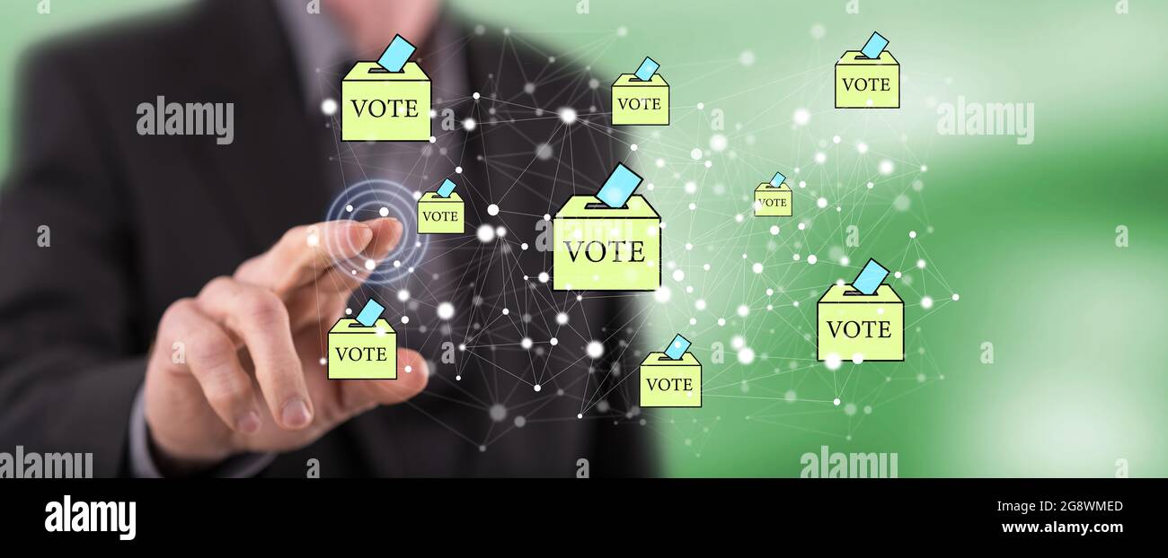 Man touching an online voting concept on a touch screen with his finger ...