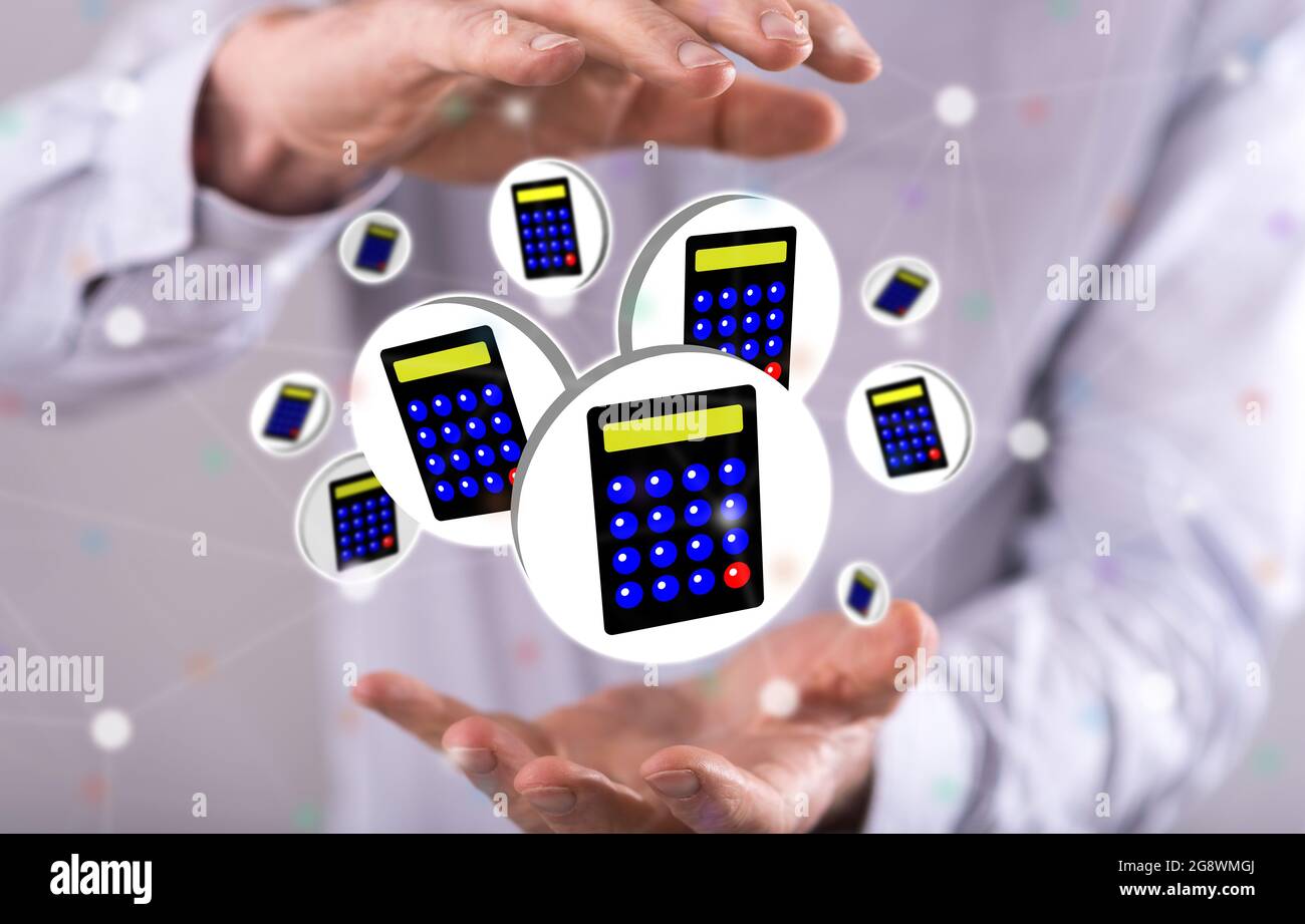 Accounting concept between hands of a man in background Stock Photo - Alamy