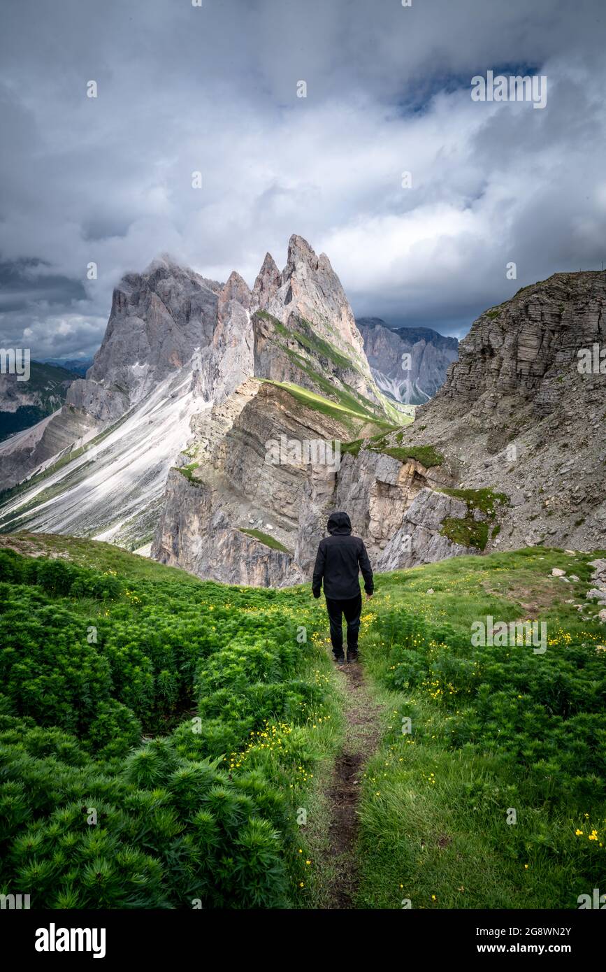 Hiking the famous Seceda mountain scene Stock Photo - Alamy