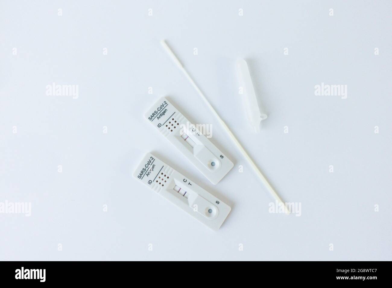 Covid-19 rapid test, antigen test, Home test next to swab showing ...