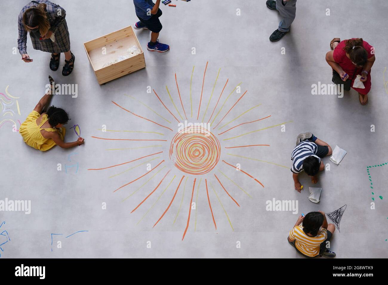 Members of the public interact with Mega Please Draw Freely by artist ...