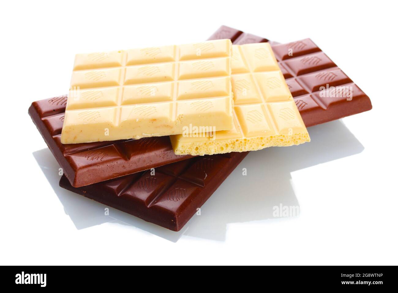 Bar of milk, dark and white chocolate isolated on white Stock Photo - Alamy