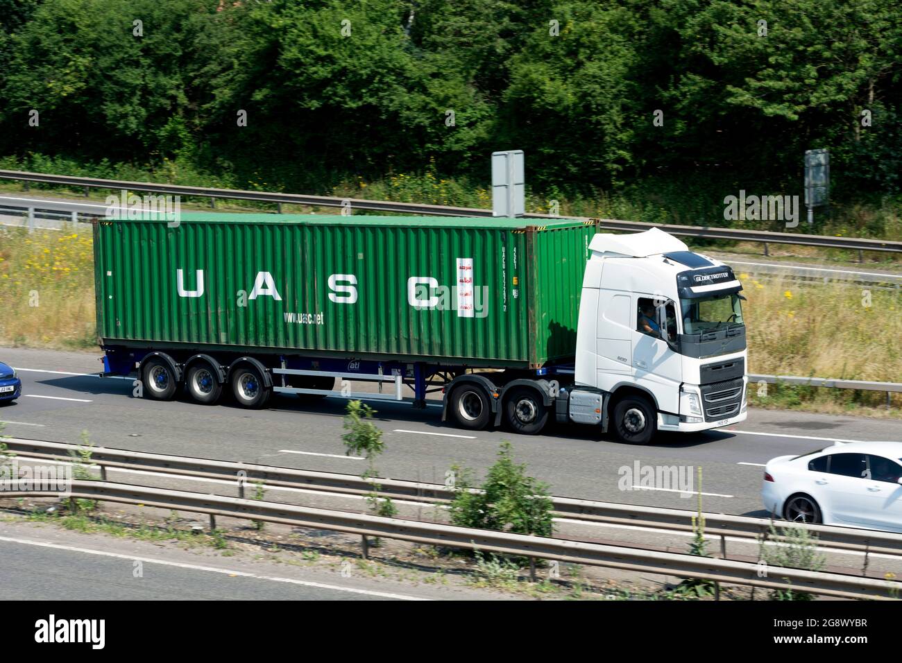 UASC shipping container transported on the M40 motorway, Warwickshire ...