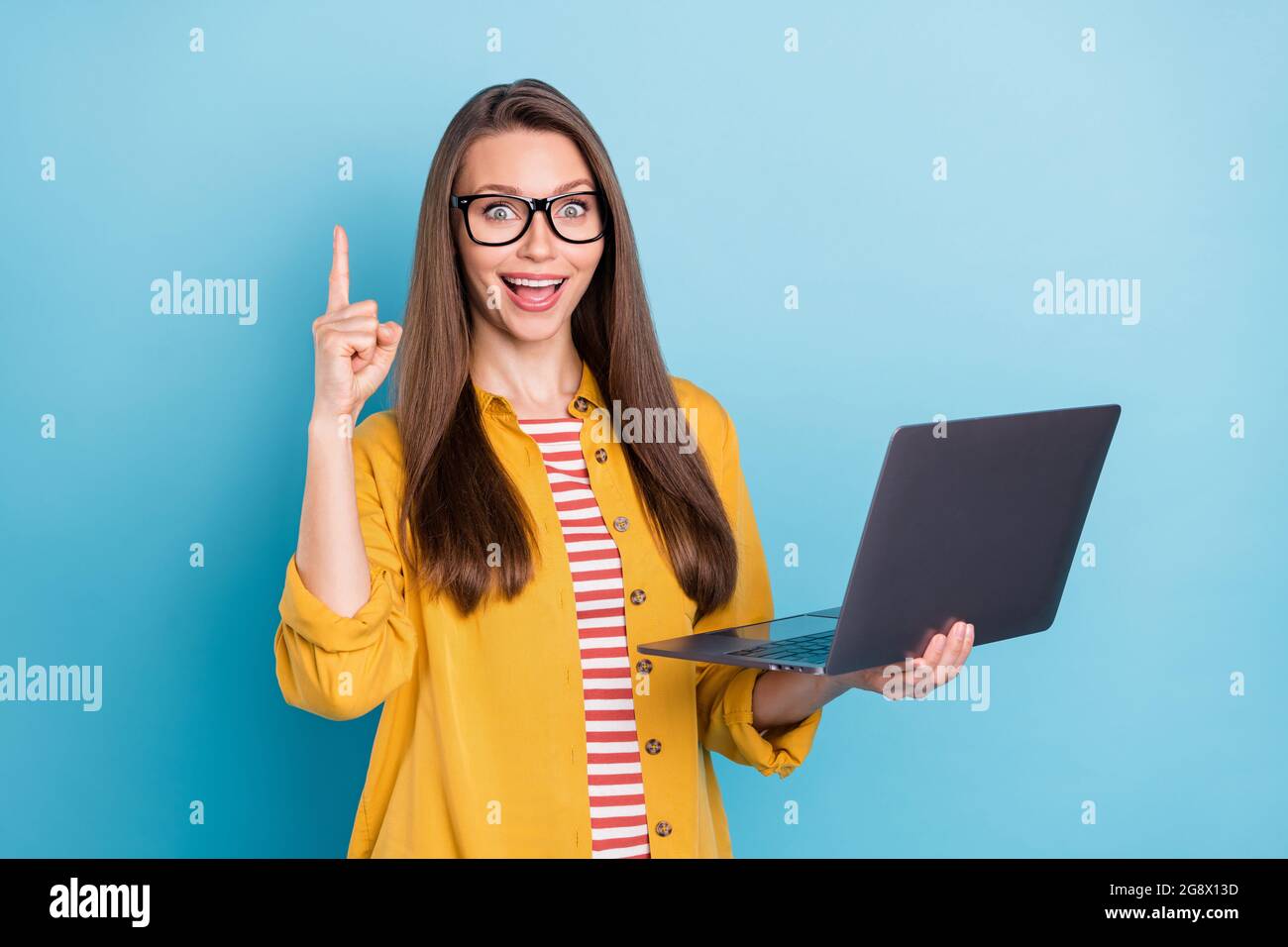 Photo of young woman happy positive smile point finger have idea genius ...