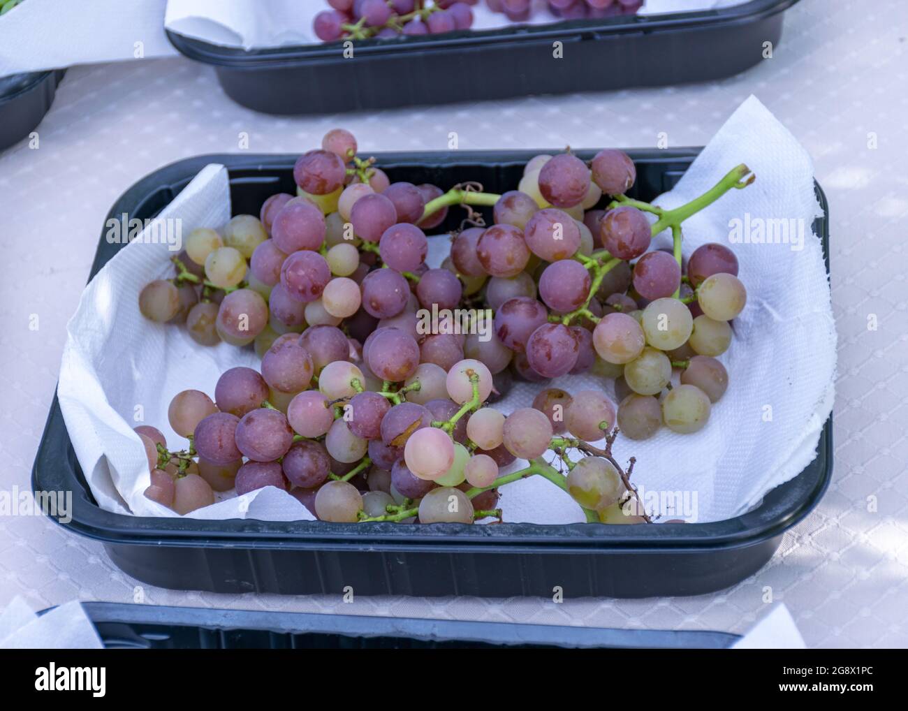 picture with grapes of different shapes and colors on the table, grape ...