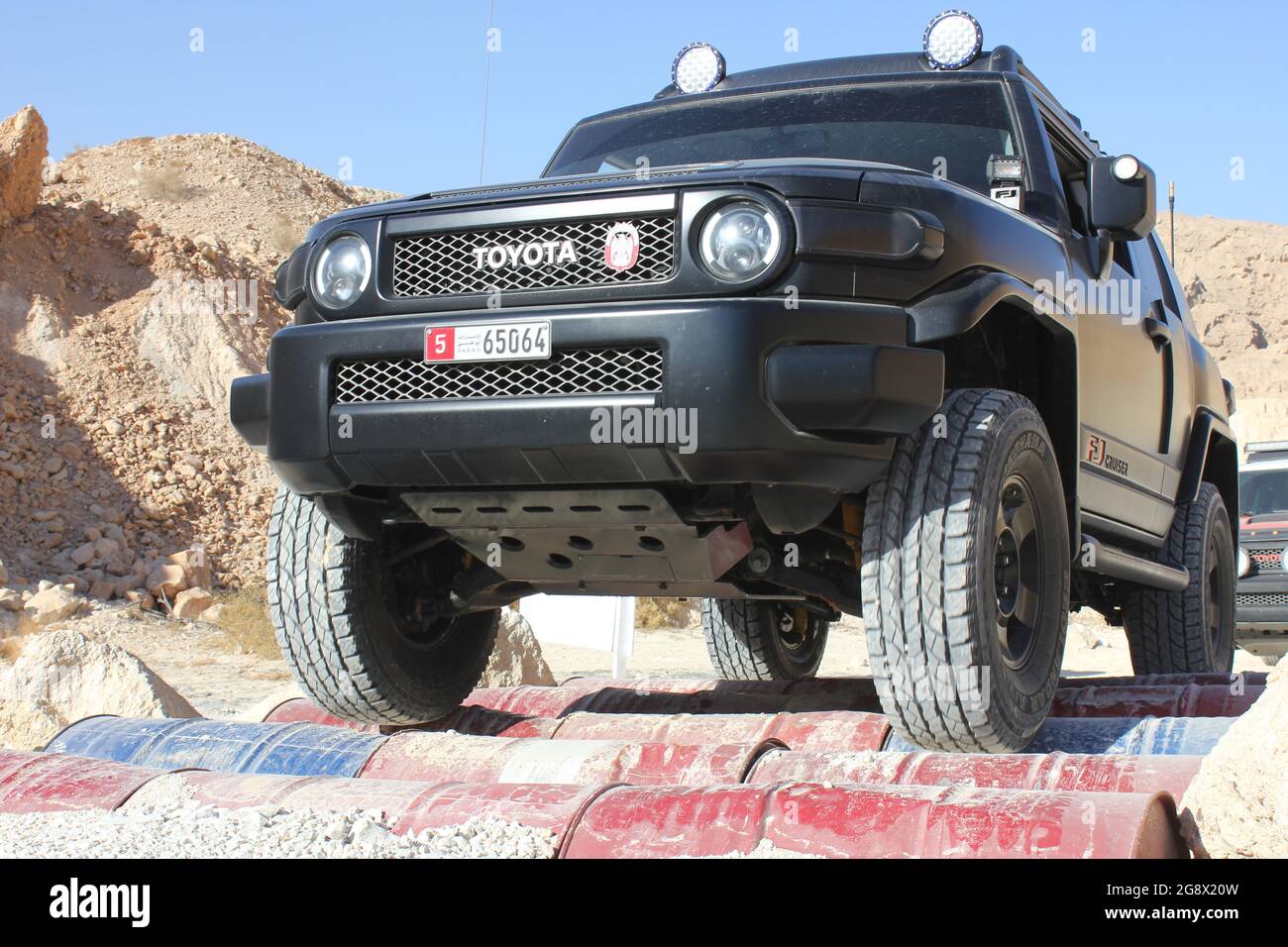 A 4x4 vehicle negotiates the Drum Shake off-road obstacle at 'XQuarry ...